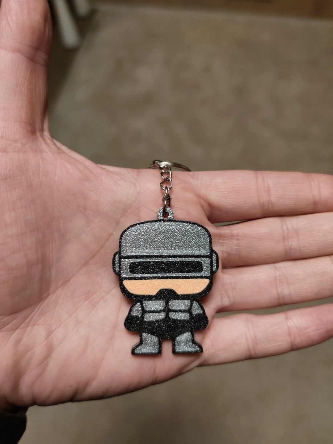 Robocop keychain 来自 Litolunar - MakerWorld