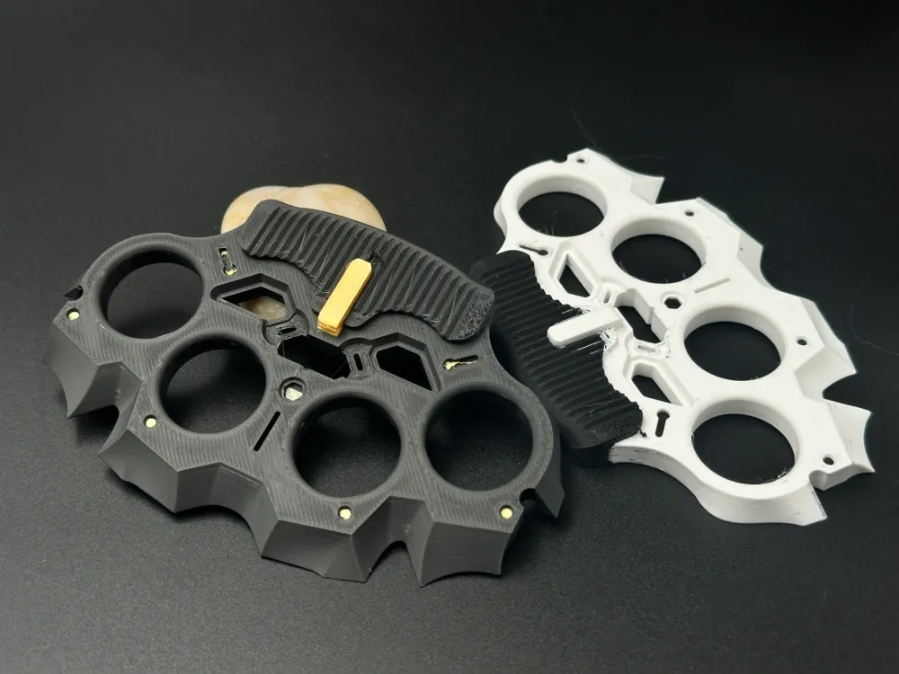 brass knuckles 来自 Trent Studio MakerWorld：免费下载 3D 模型