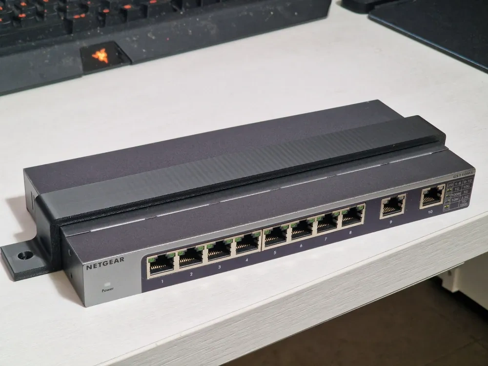 Netgear GS110MX 交换机挂载支架 来自 IfritDMC MakerWorld：免费下载 3D 模型